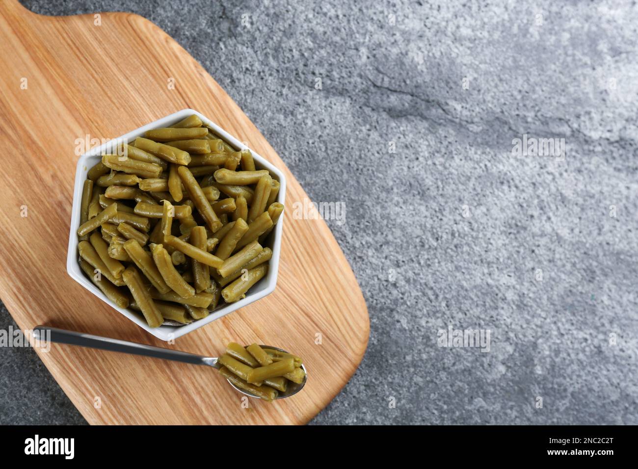 Canned green beans on grey table, top view. Space for text Stock Photo ...