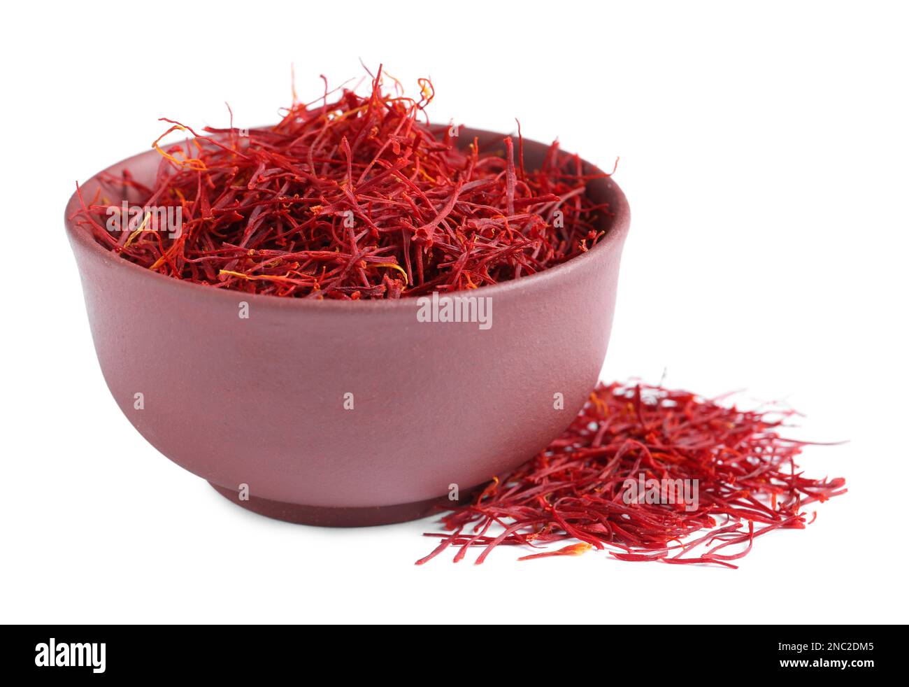 Dried saffron and bowl on white background Stock Photo - Alamy