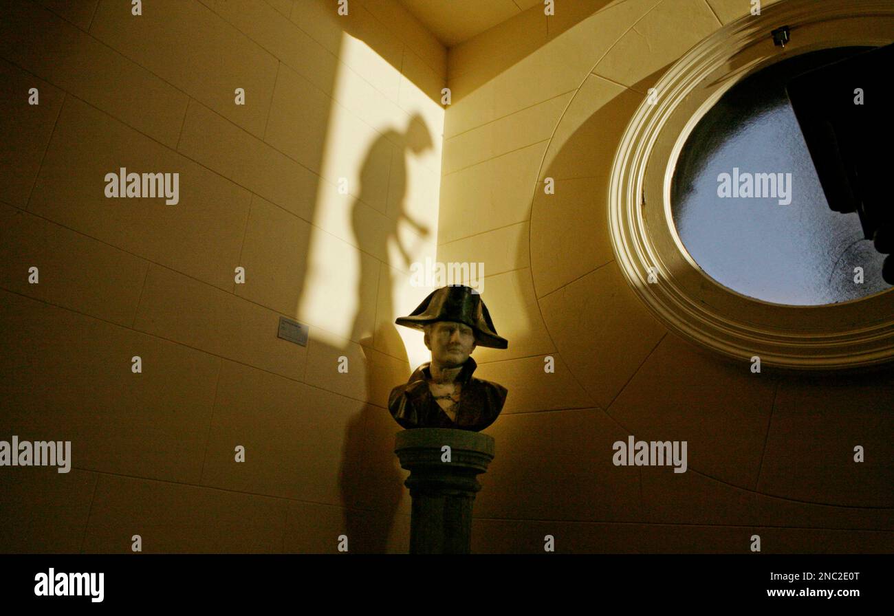 A worker's shadow is cast on a wall of the newly renovated Napoleonic ...