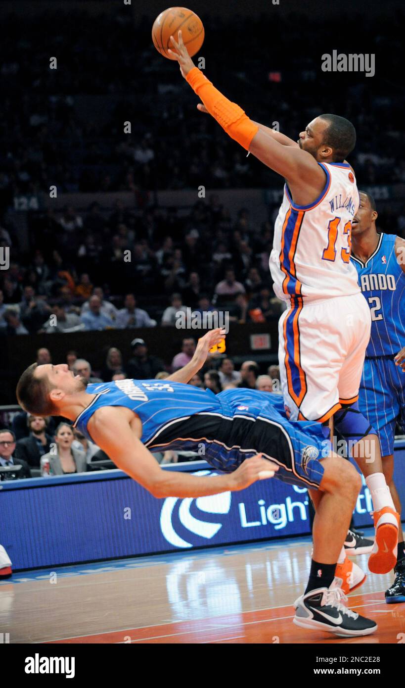 New York Knicks' Shelden Williams, right, runs into Orlando Magic ...