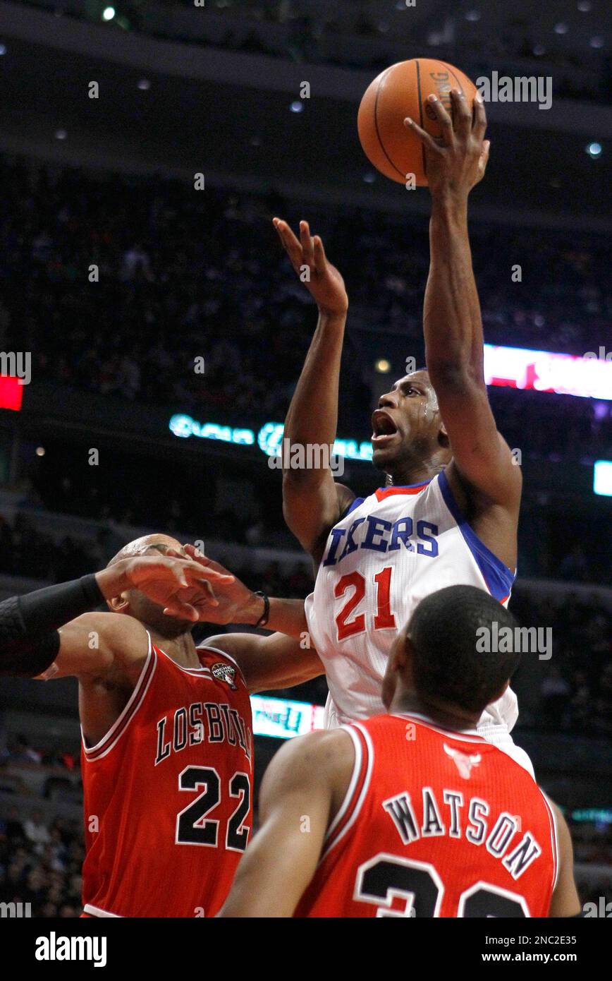 Philadelphia 76ers forward Thaddeus Young, right, shoots over Chicago ...