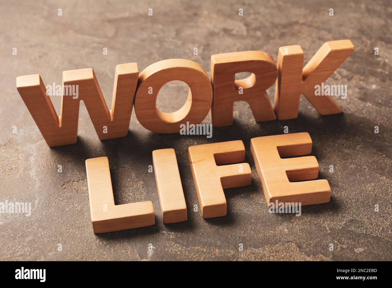 Words Work, Life made with wooden letters on grey table, above view ...