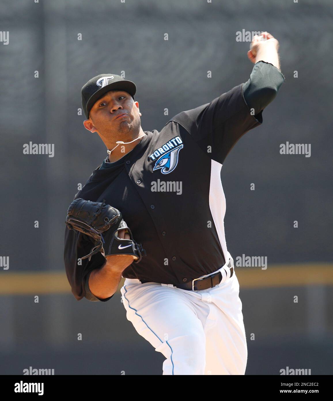 Toronto Blue Jays starting pitcher Ricky Romero delivers a warm-up ...