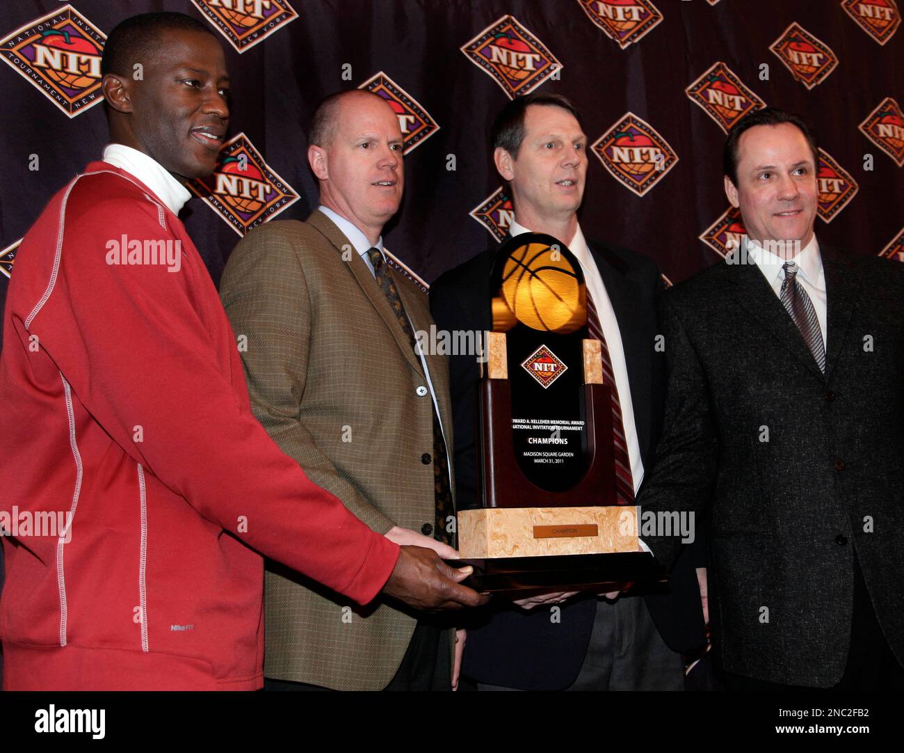 College basketball coaches from left, Alabama's Anthony Grant, Colorado ...