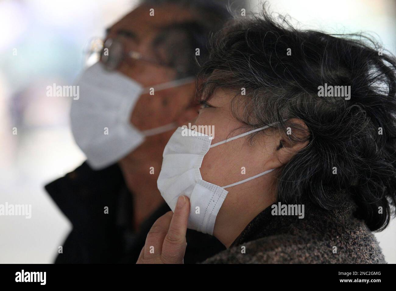 People look for their relatives on the name list of victims at the ...