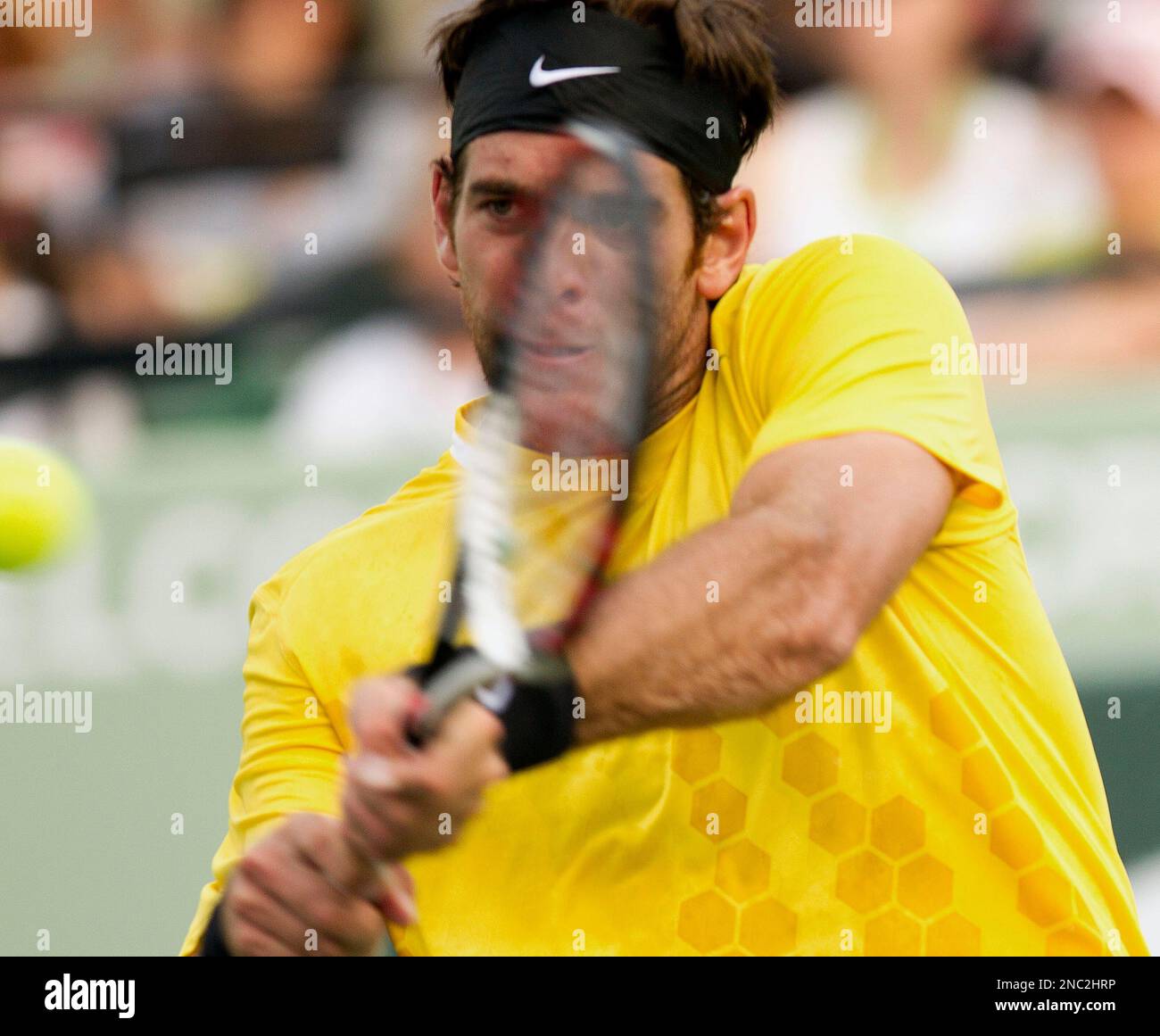 Juan Martin del Potro, from Argentina, hits the ball back to Robin ...