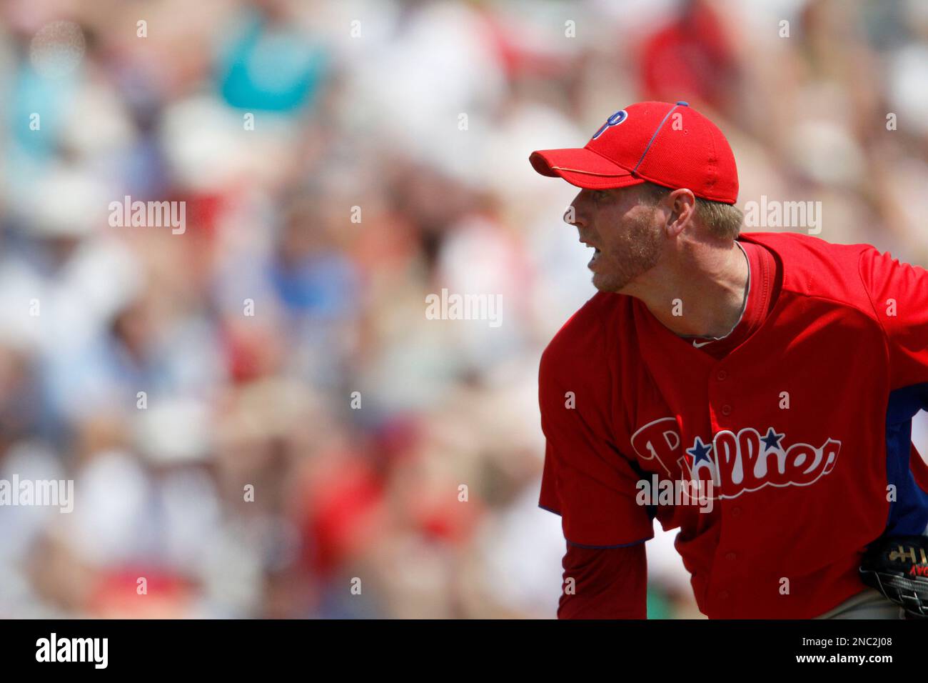 Philadelphia Phillies pitcher Roy Halladay throws a pitch in a spring ...