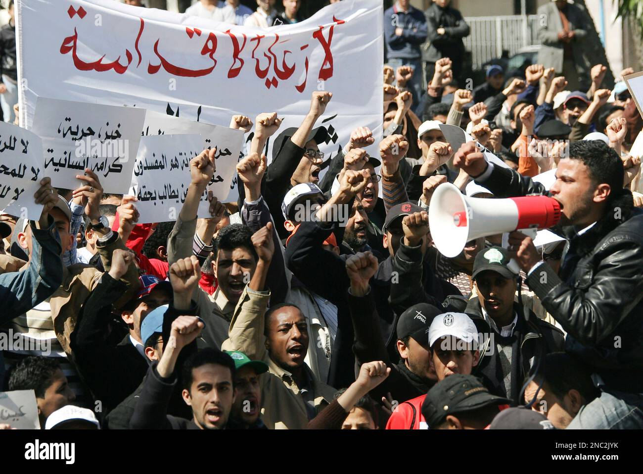 Anti government protesters are seen during a really in Casablanca ...