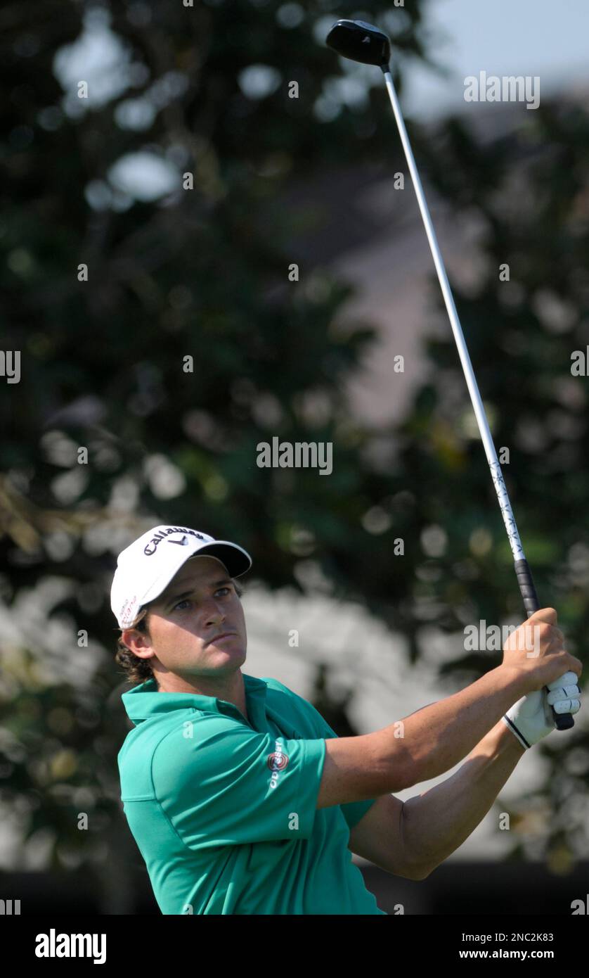 Sam Saunders watches his tee shot on the first hole during the final ...
