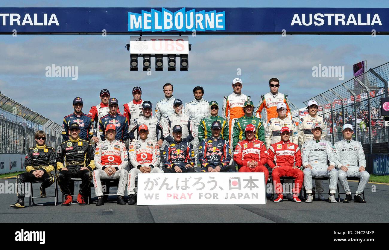 Formula One drivers, from left in front row, Nick Heidfeld, Vitaly ...