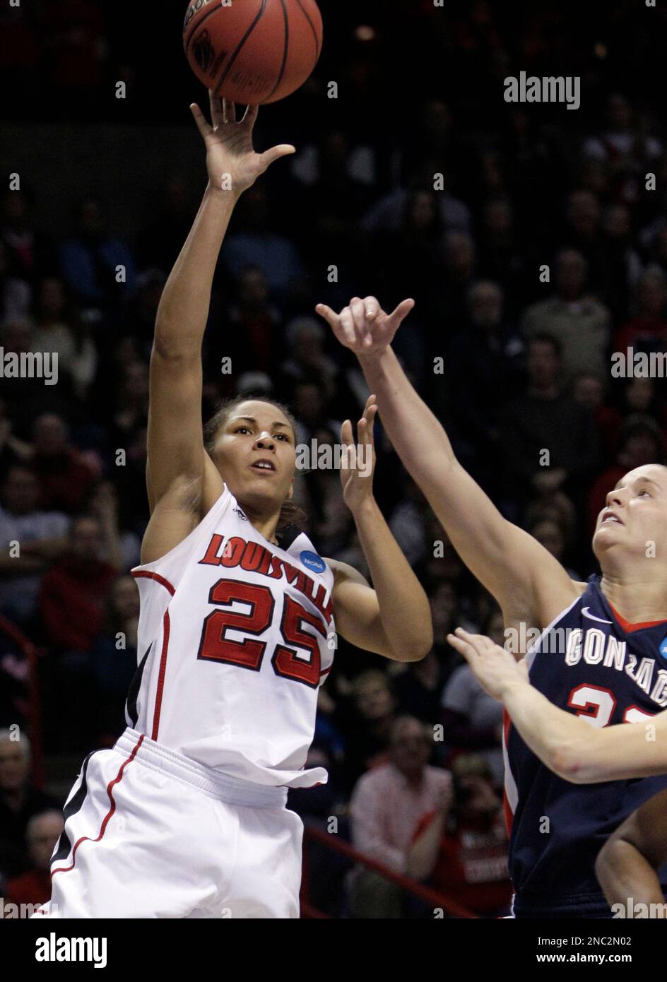 Louisville's Tia Gibbs (25) shoots as Gonzaga's Kayla Standish defends ...