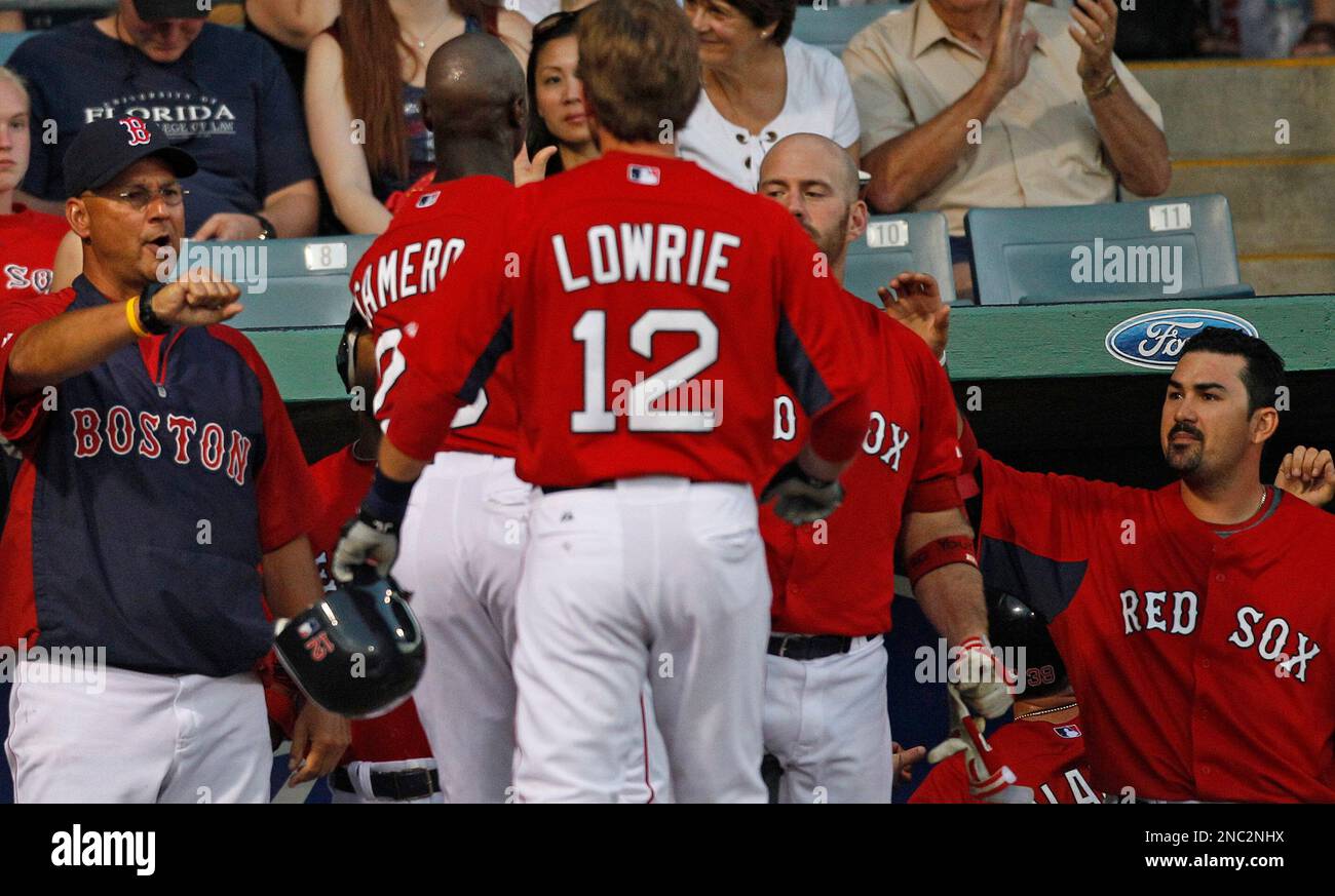 Boston Red Sox manager Terry Francona, left, and Adrian Gonzalez, right ...