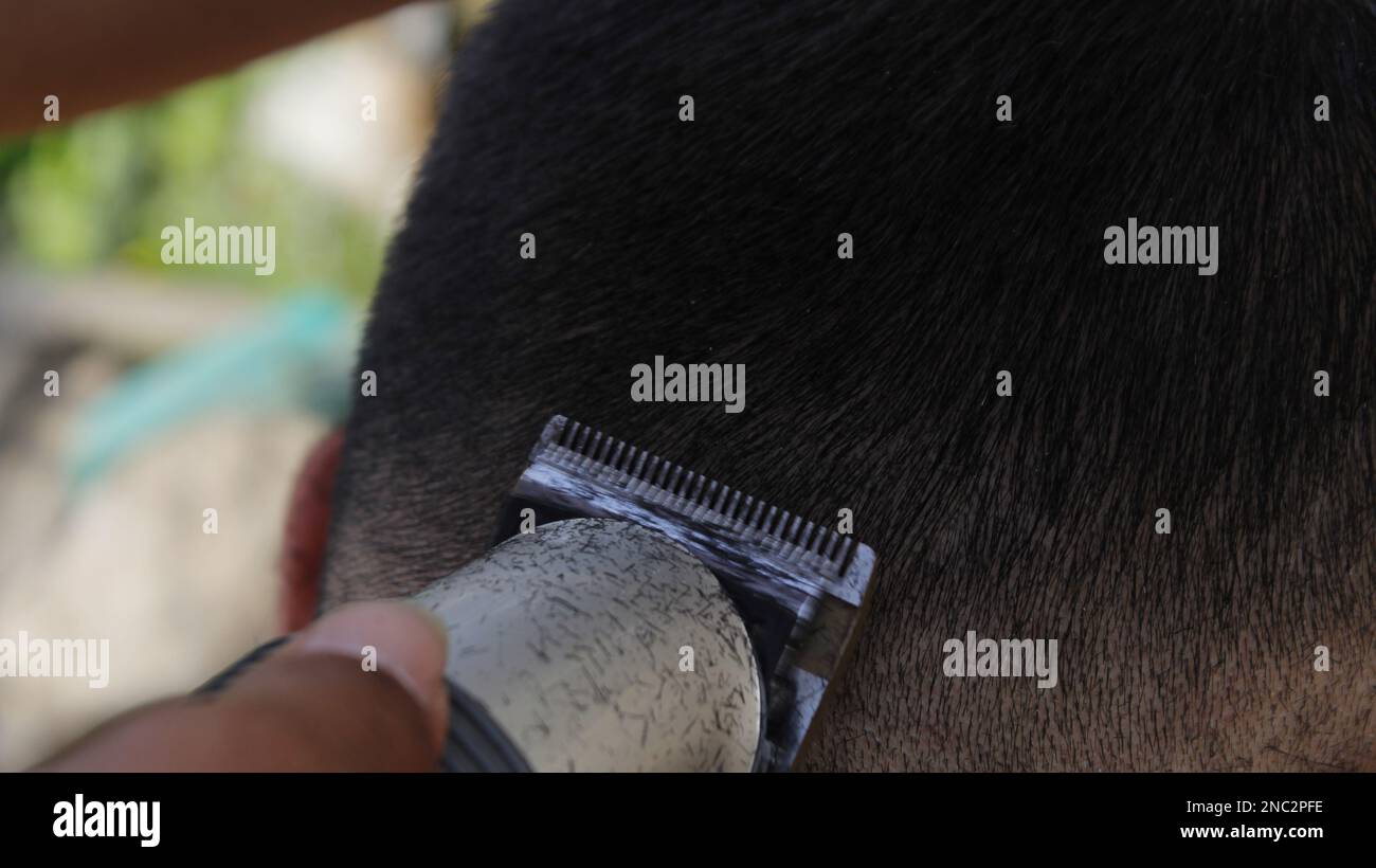 A man getting his hair cut hi-res stock photography and images - Alamy