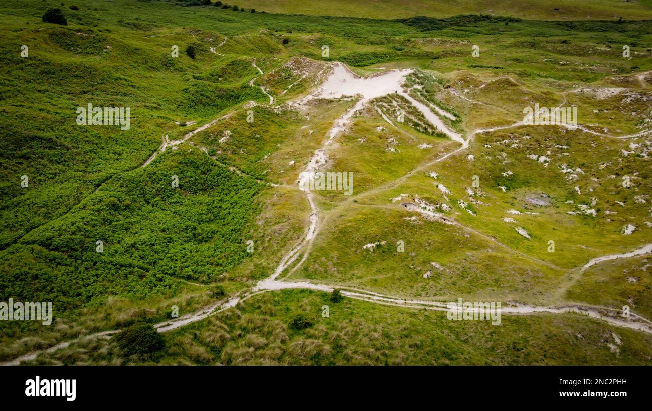 Picturesque hills of Ireland, top view. Sand dunes covered with ...