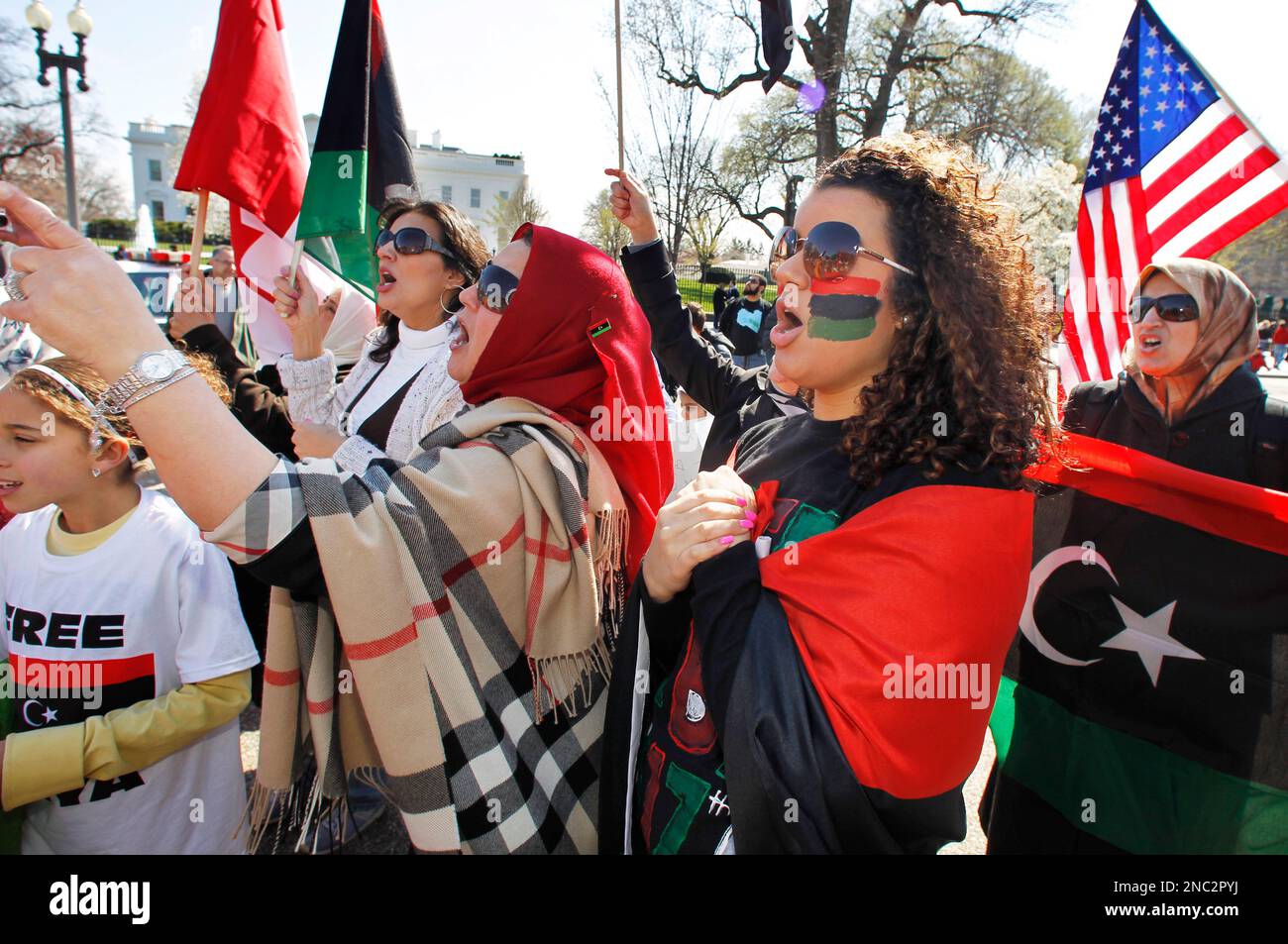Mariam Jamal Ismail, front right, and Randa Elzouzary, center, both ...
