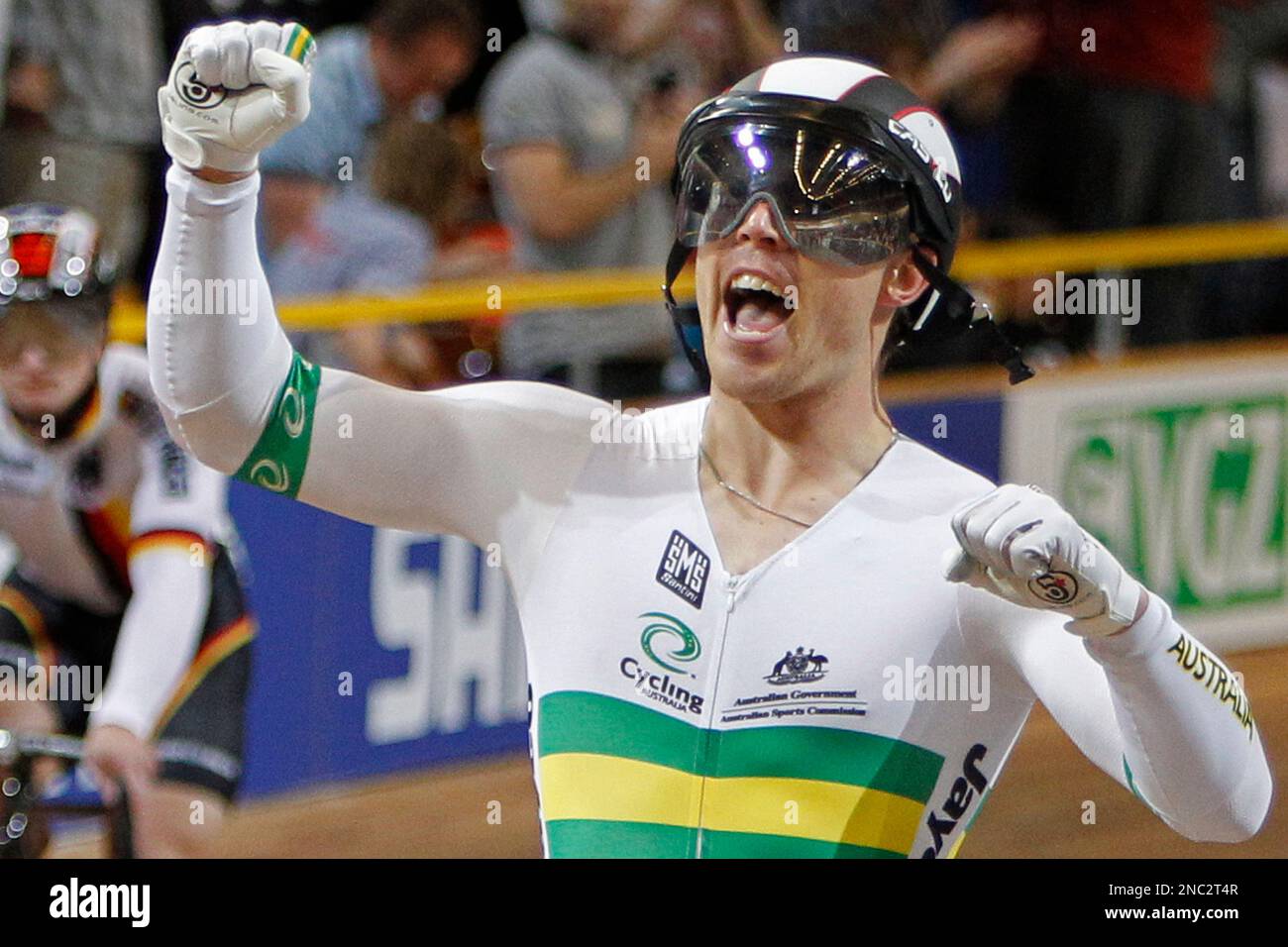 New world champion Shane Perkins of Australia jubilates after crossing ...