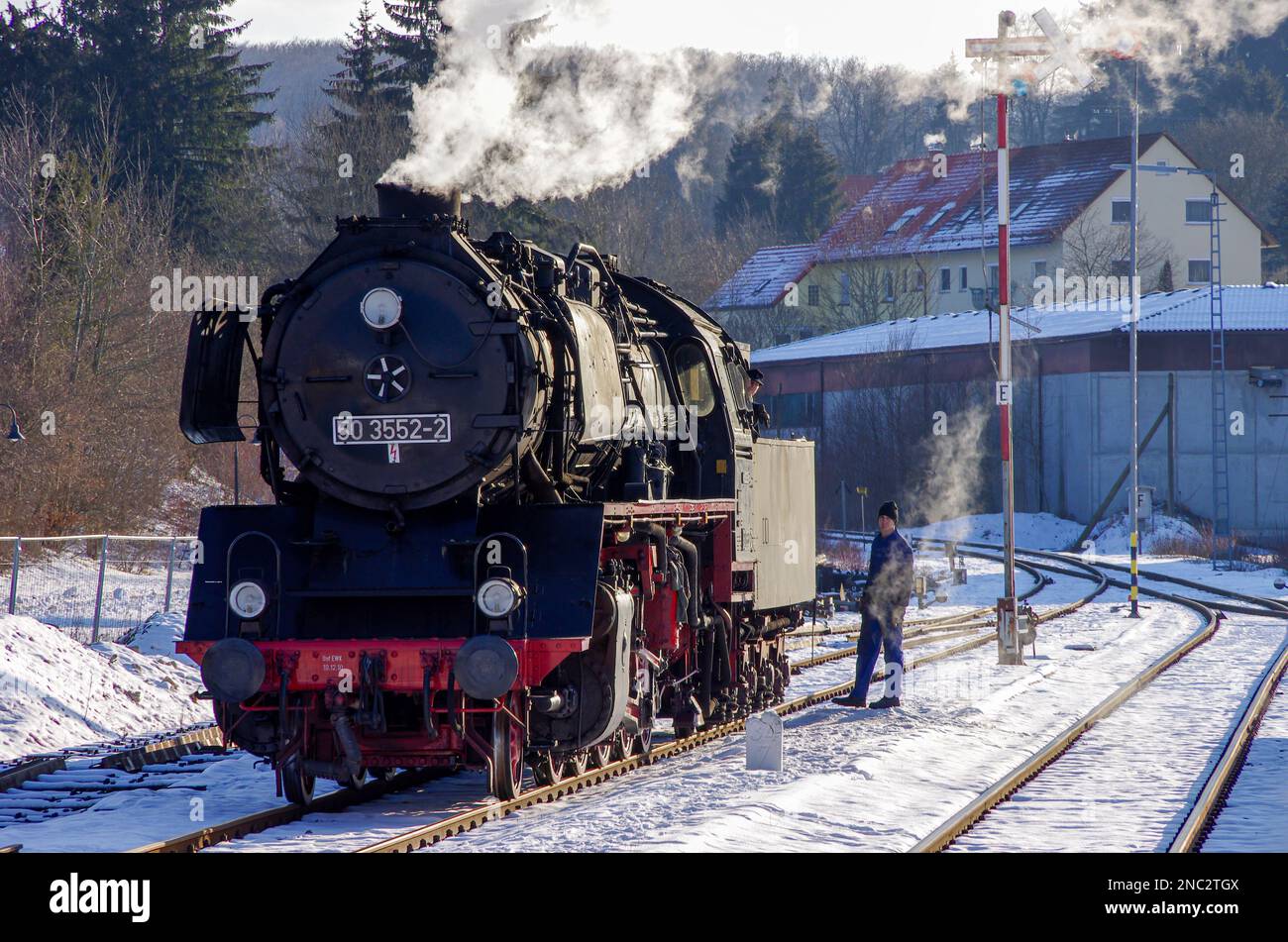 Railway and station scene, steam locomotive 50 3552-2 in service of the ...