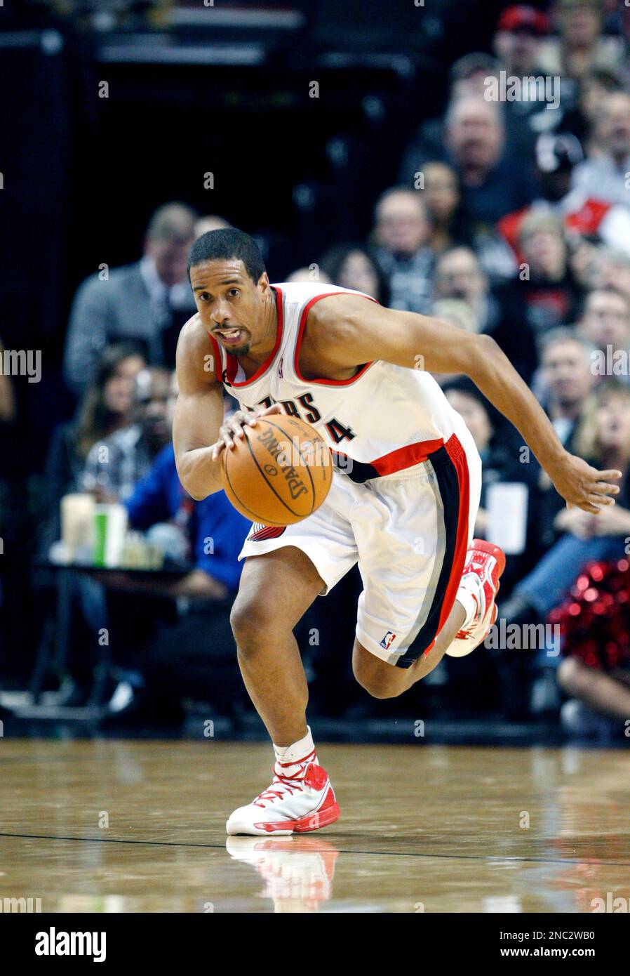 Portland Trail Blazers' Andre Miller (24) brings the ball up court in ...