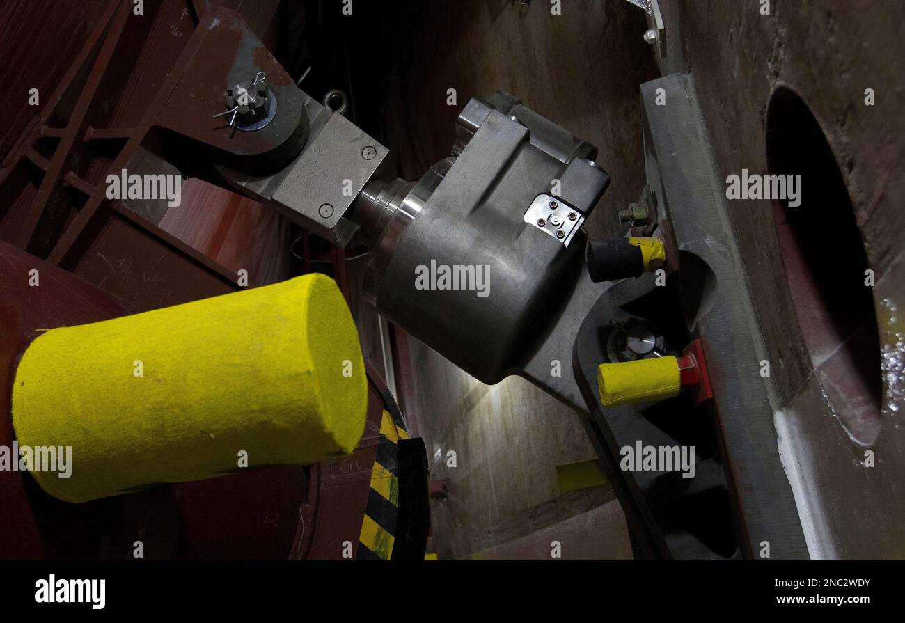 A snubber (shock absorber) is pictured underneath the suppression ...