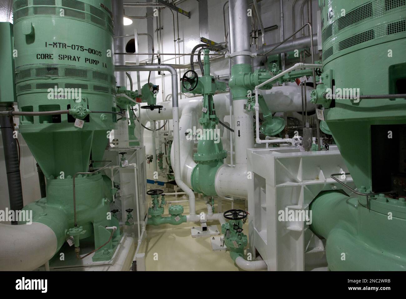 Steam driven backup pumps stand ready for use outside the Unit 1 ...