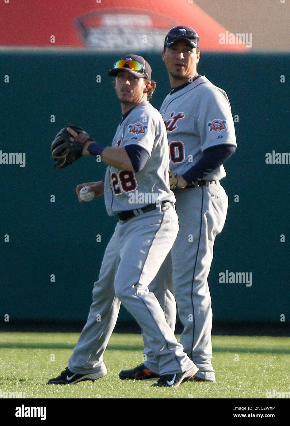 Detroit Tigers second baseman Will Rhymes (28) and Detroit Tigers right ...