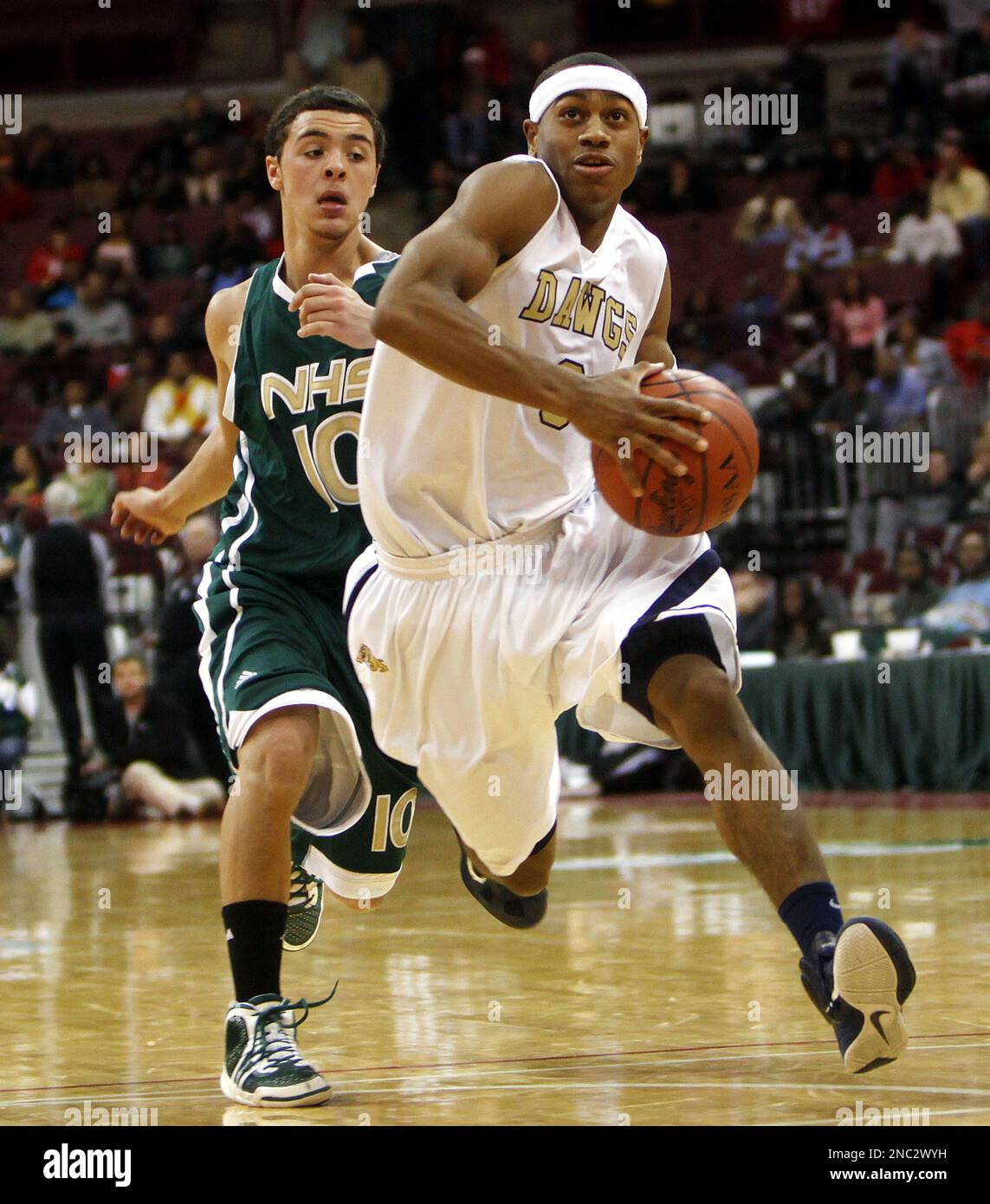 Garfield Heights' Trey Lewis, right, drives past Northland's Jordon ...