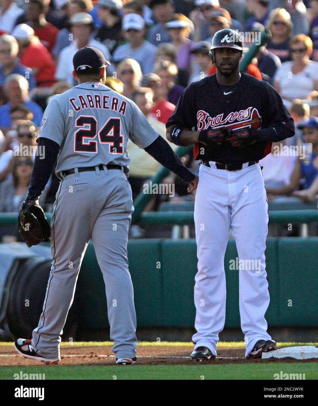 Detroit Tigers first baseman Miguel Cabrera (24) greets Atlanta Braves ...