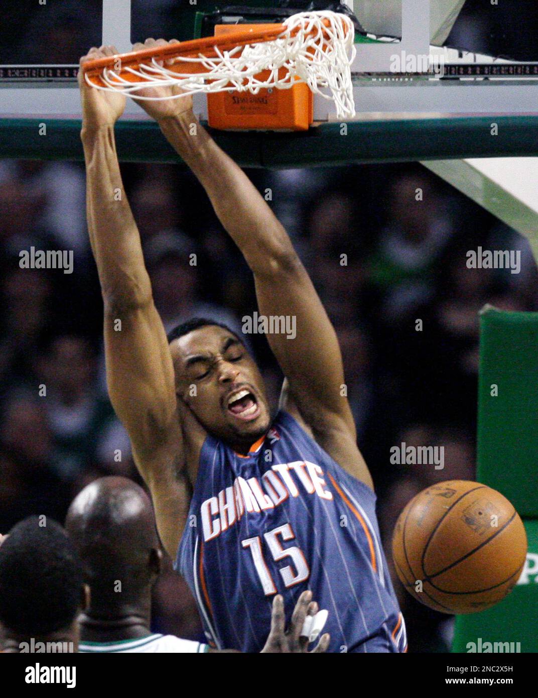 Charlotte Bobcats guard Gerald Henderson (15) dunks against the Boston ...