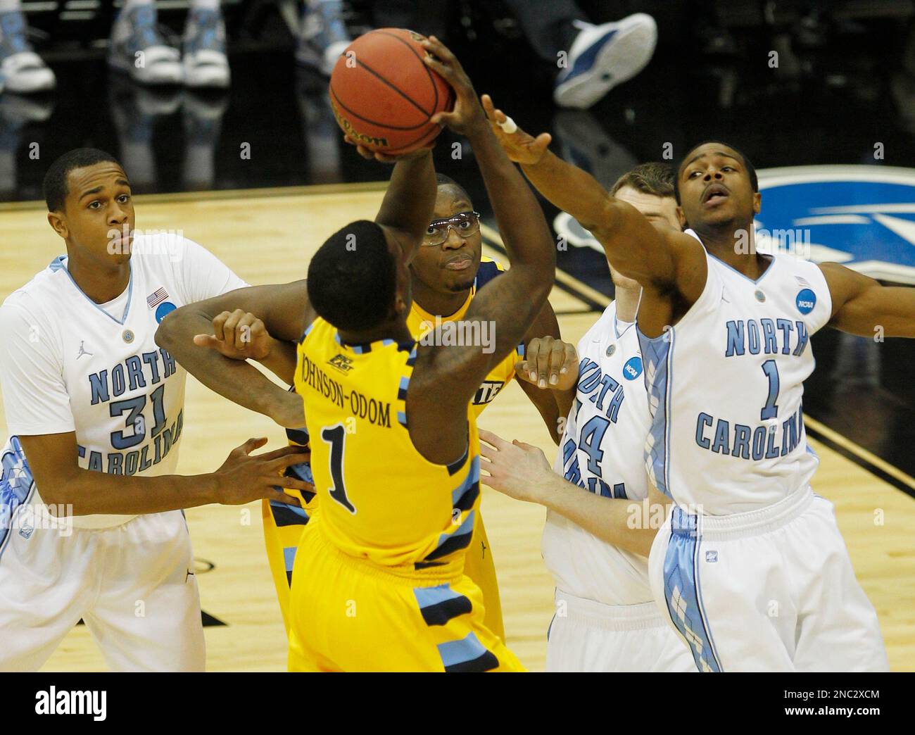 North Carolina's Dexter Strickland (1) defends Marquette's Darius ...
