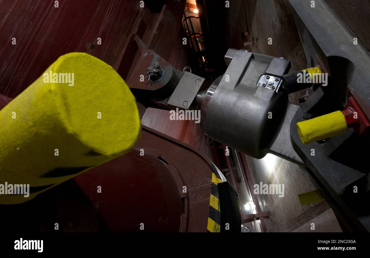 A snubber (shock absorber) is pictured underneath the suppression ...