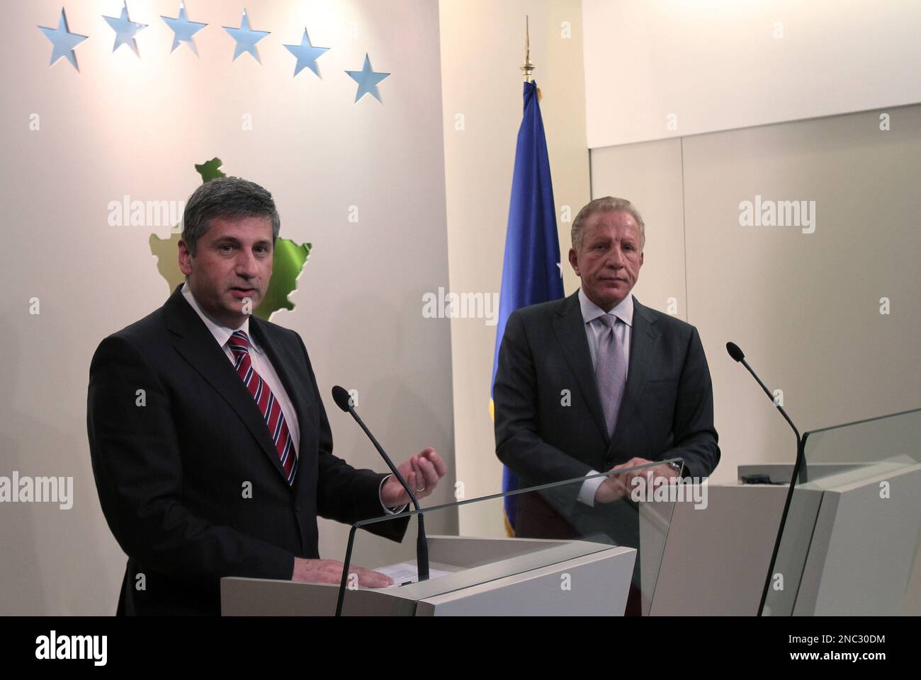 Kosovo President Behxhet Pacolli, right, listens as Austrian Foreign ...