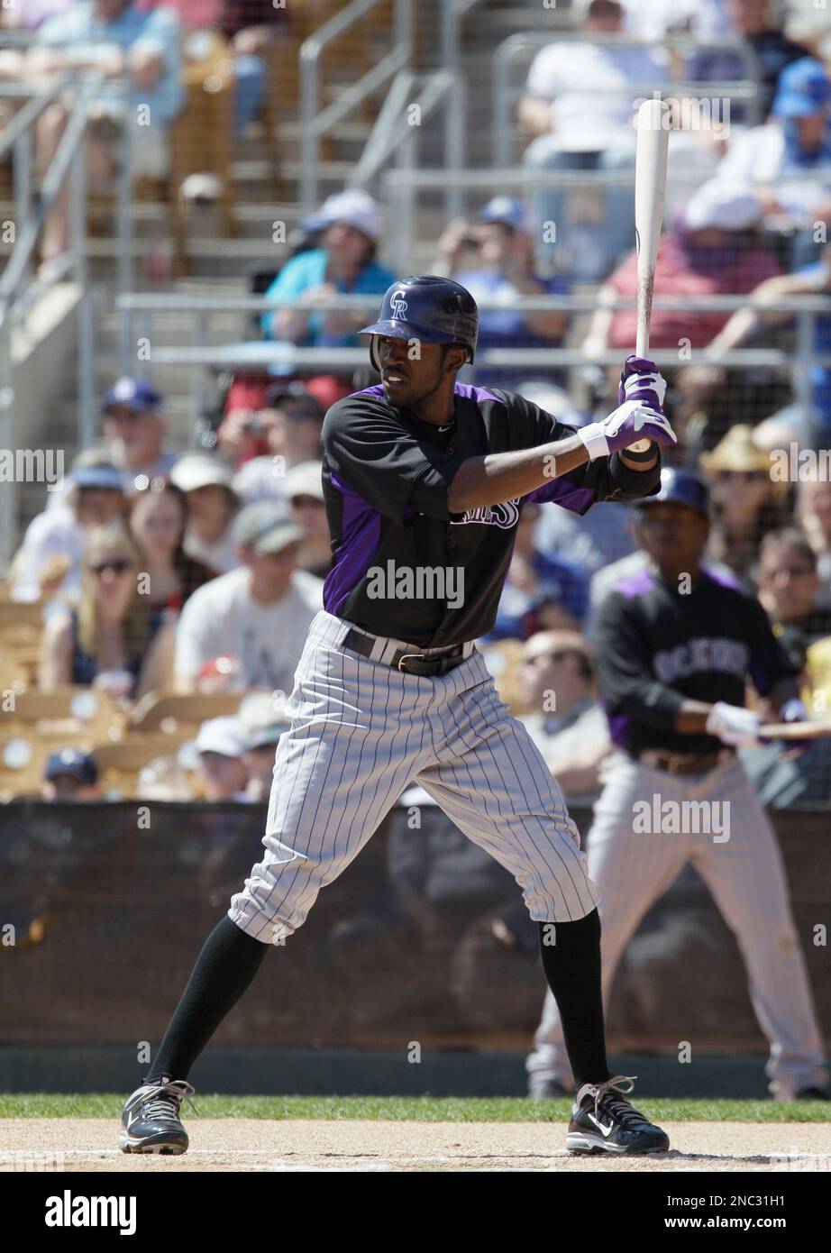 Colorado Rockies' Dexter Fowler waits to bat during the first inning of ...