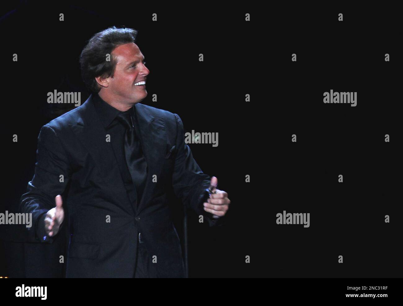 Mexican singer Luis Miguel performs during a concert in Monterrey ...