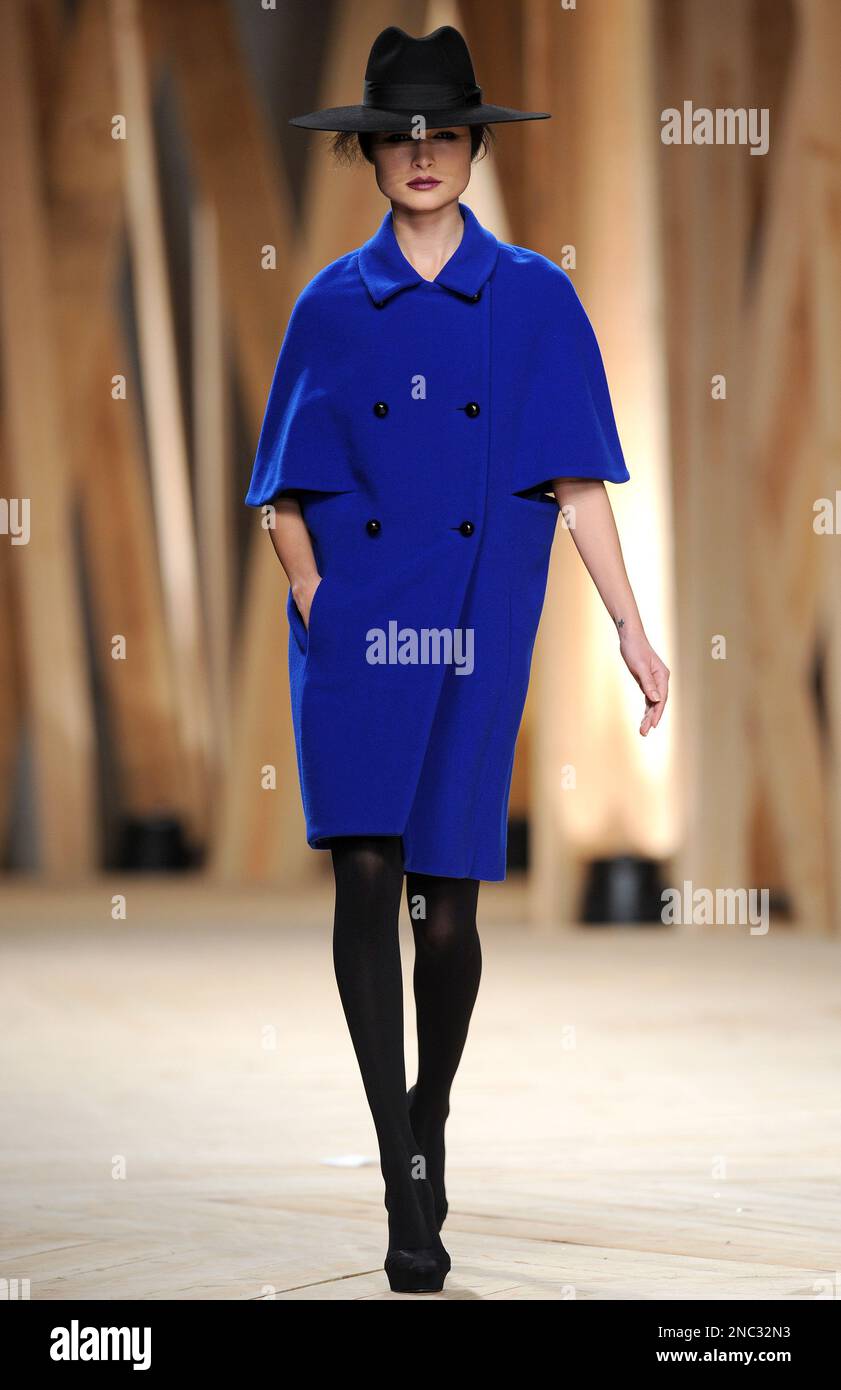 A model displays a creation by Portuguese designers Manuel Alves and ...