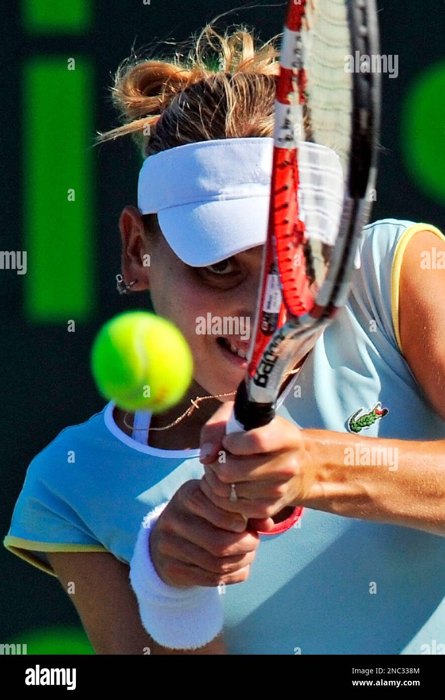 ** ALTERNATE CROP ** Elena Vesnina of Russia, returns a shot back to ...