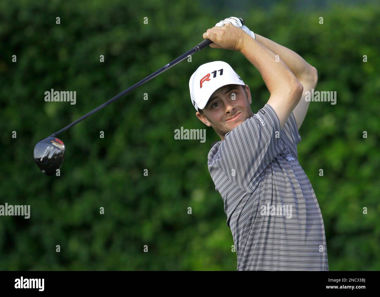 Spencer Levin makes a shot from the ninth tee during the first round of ...