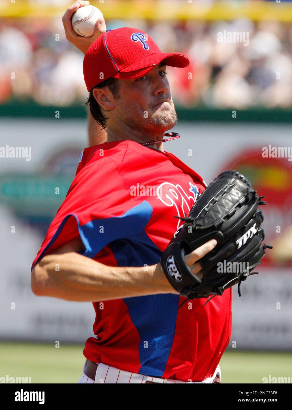 Philadelphia Phillies pitcher Cole Hamels warms up before the first ...