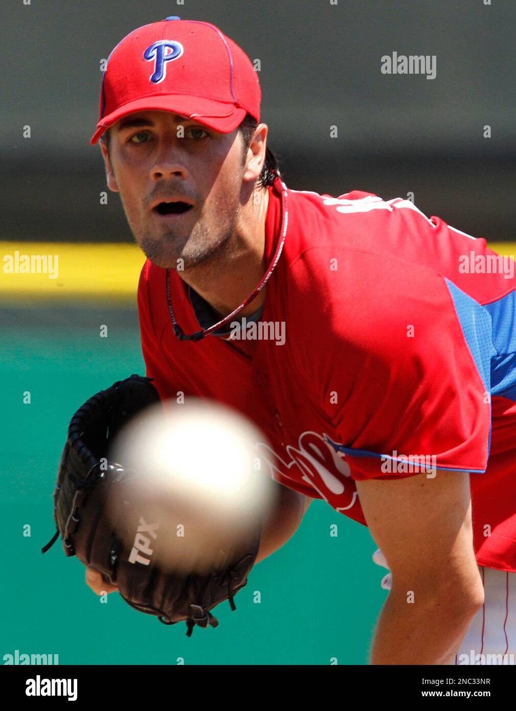 Philadelphia Phillies pitcher Cole Hamels warms up before the first ...
