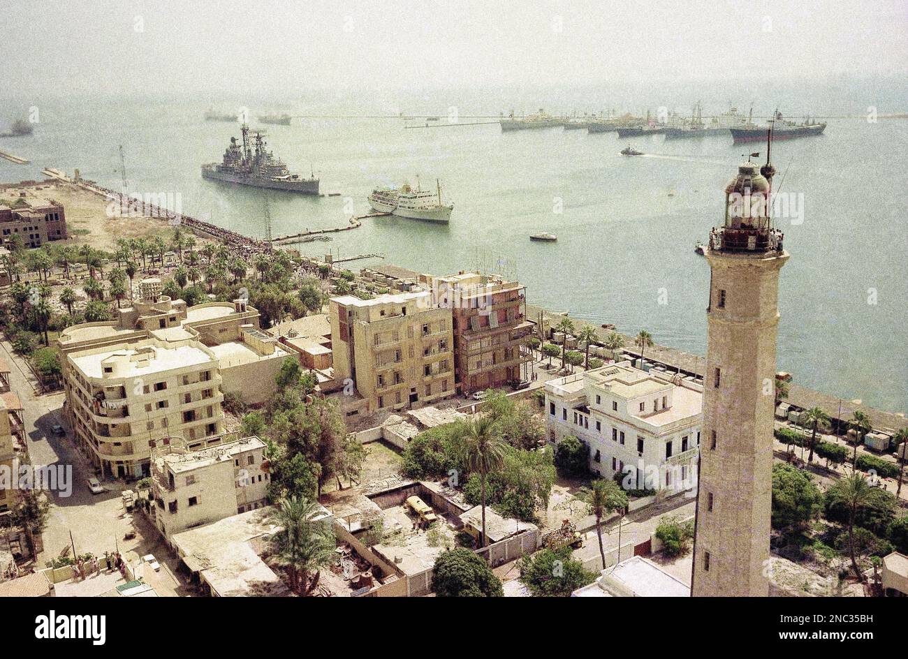 Ten thousands throng the docks and quays of Port Said at the northern ...