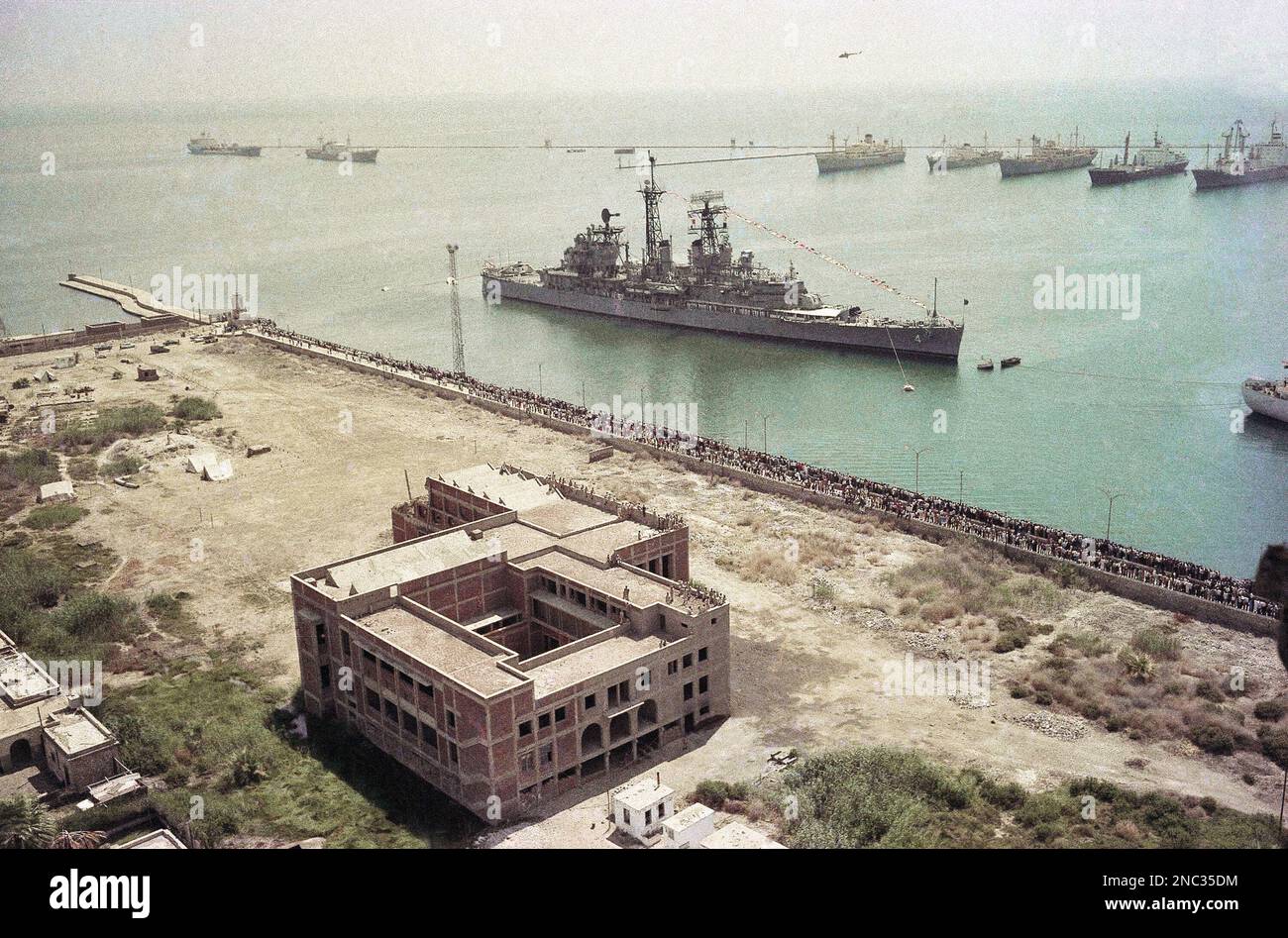 A view of the first shipping passing through the newly reopened Suez ...