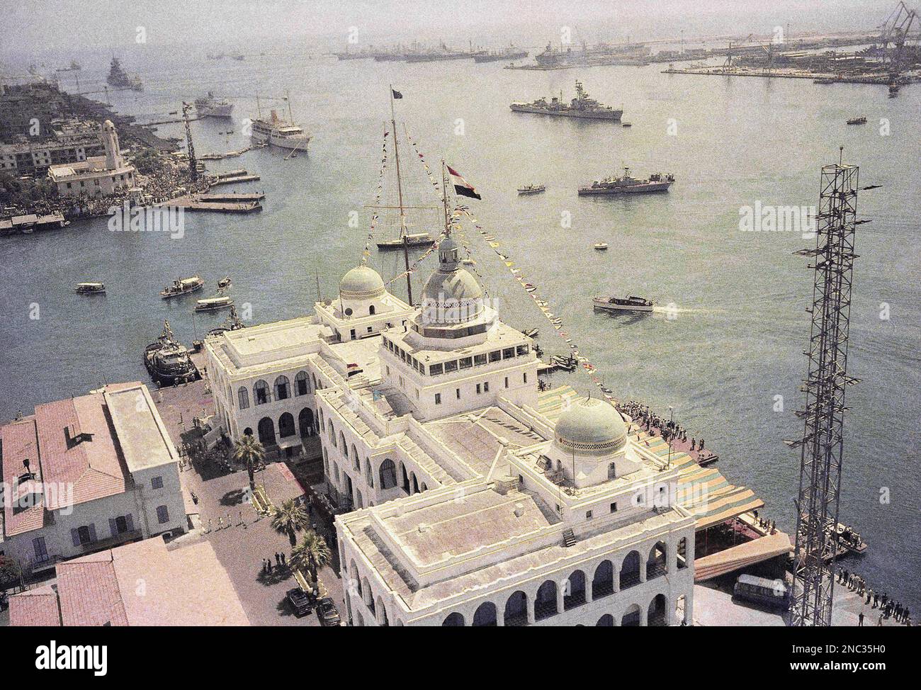A view of the first shipping passing through the newly reopened Suez ...