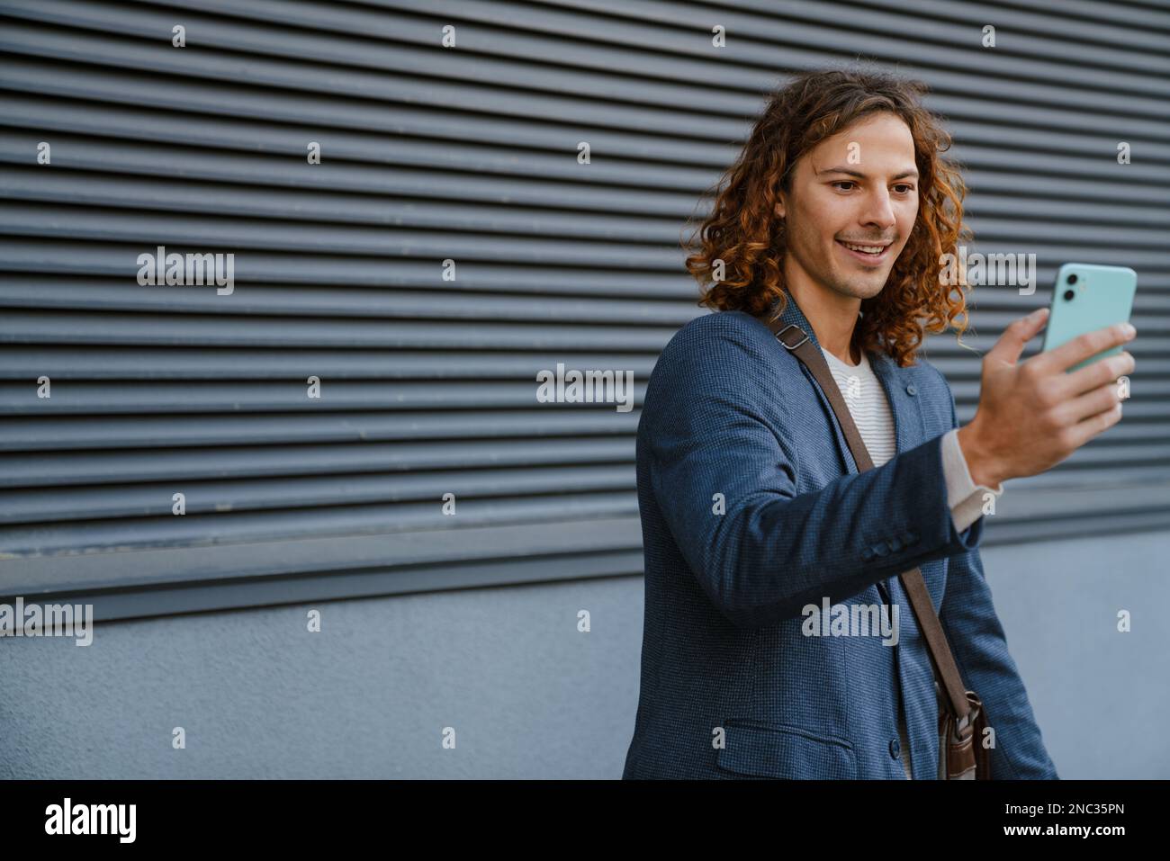 Young ginger man standing near hi-res stock photography and images - Alamy