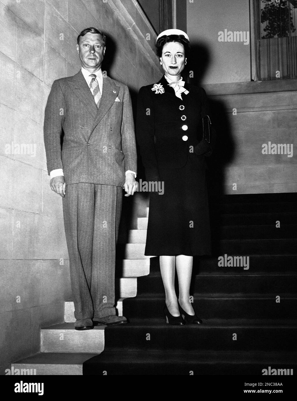 The Duke and Duchess of Windsor pause on the steps of the grand ...
