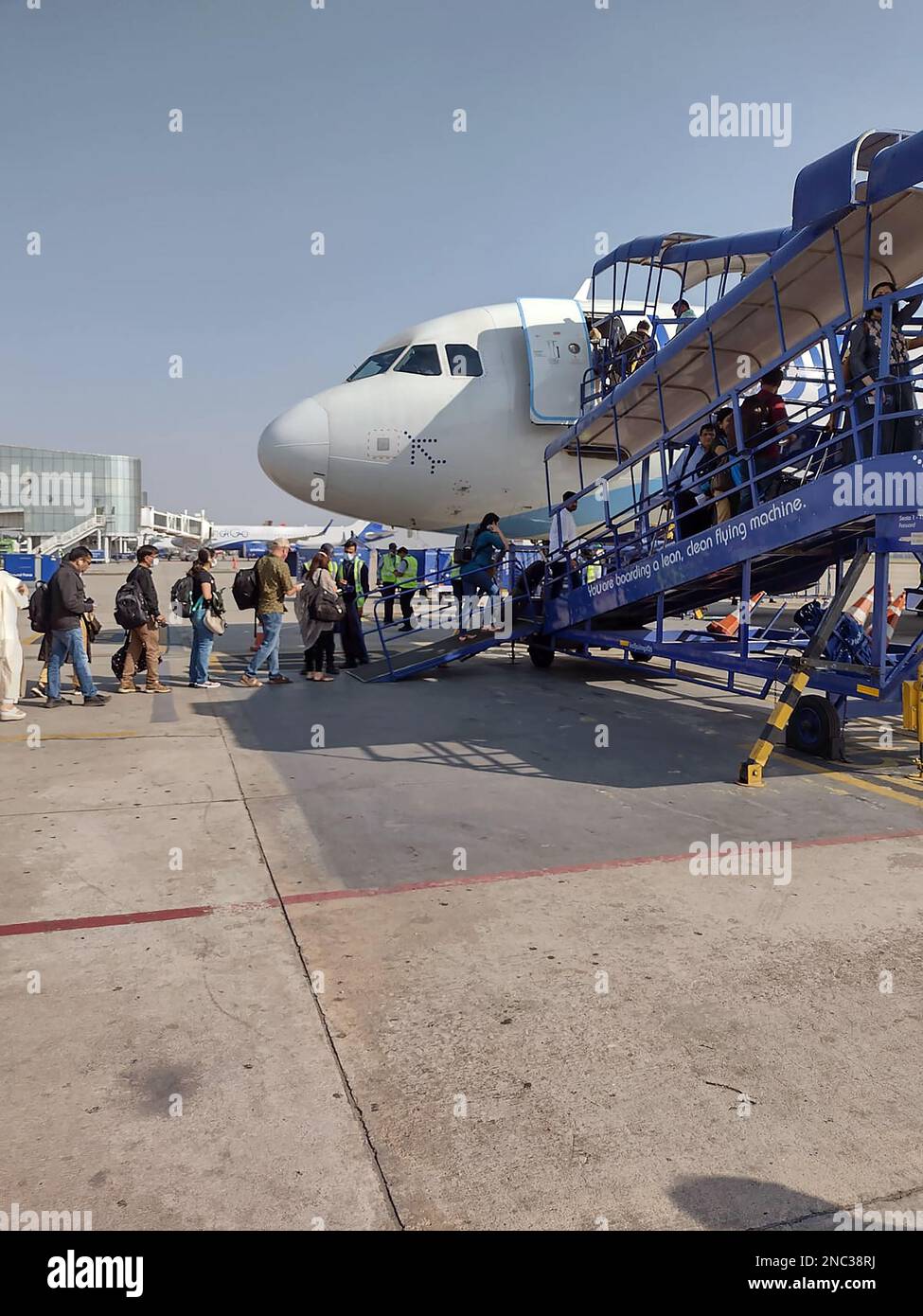 Airplane on the airport runway - indian airline Stock Photo - Alamy