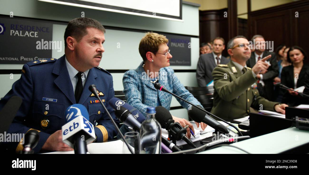 From right, Italian Colonel Massimo Panizzi, NATO spokesperson Oana ...