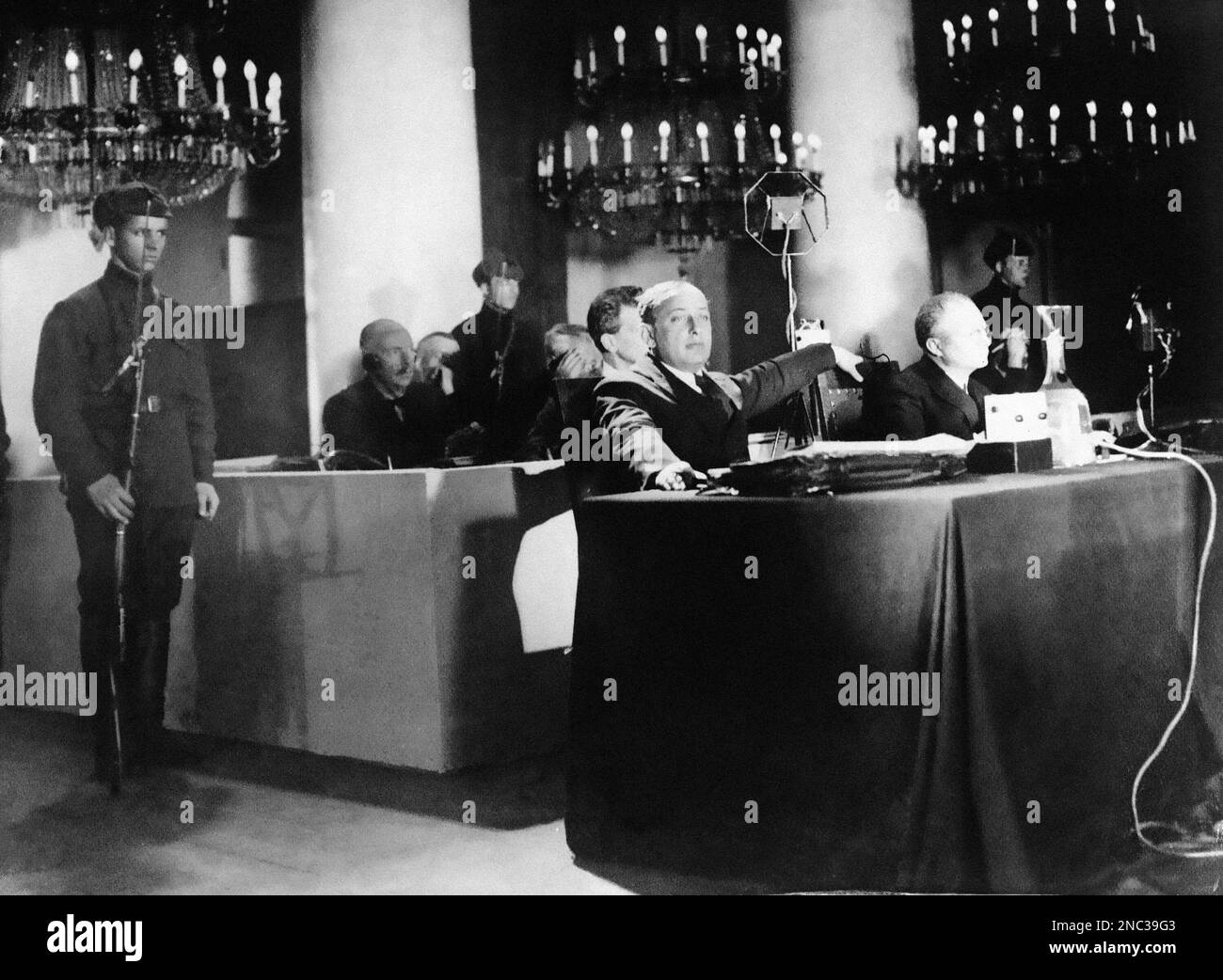 The defendants accused of plotting against the Soviet, are guarded ...