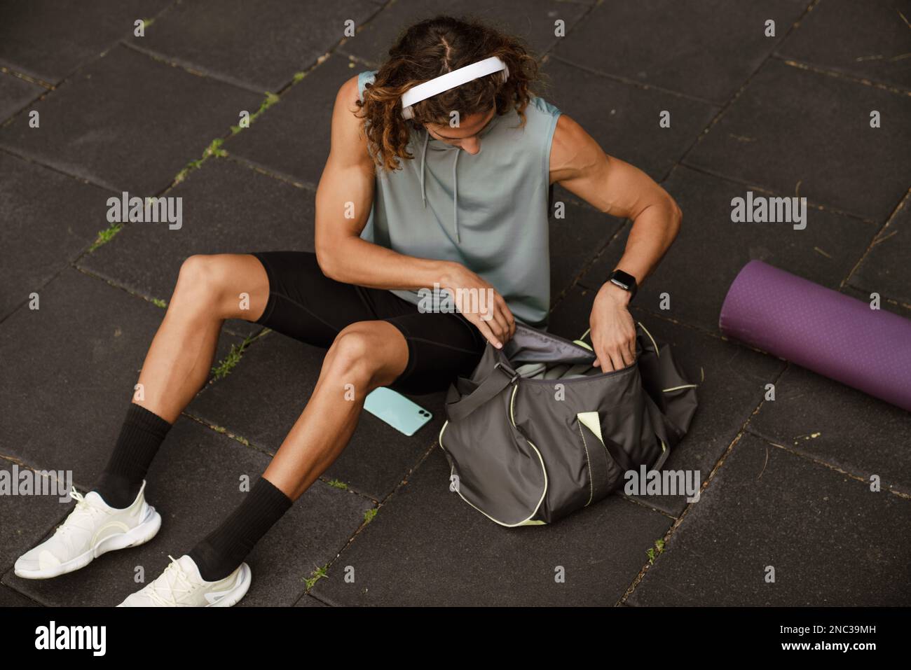 Rummaging in bag hi-res stock photography and images - Alamy