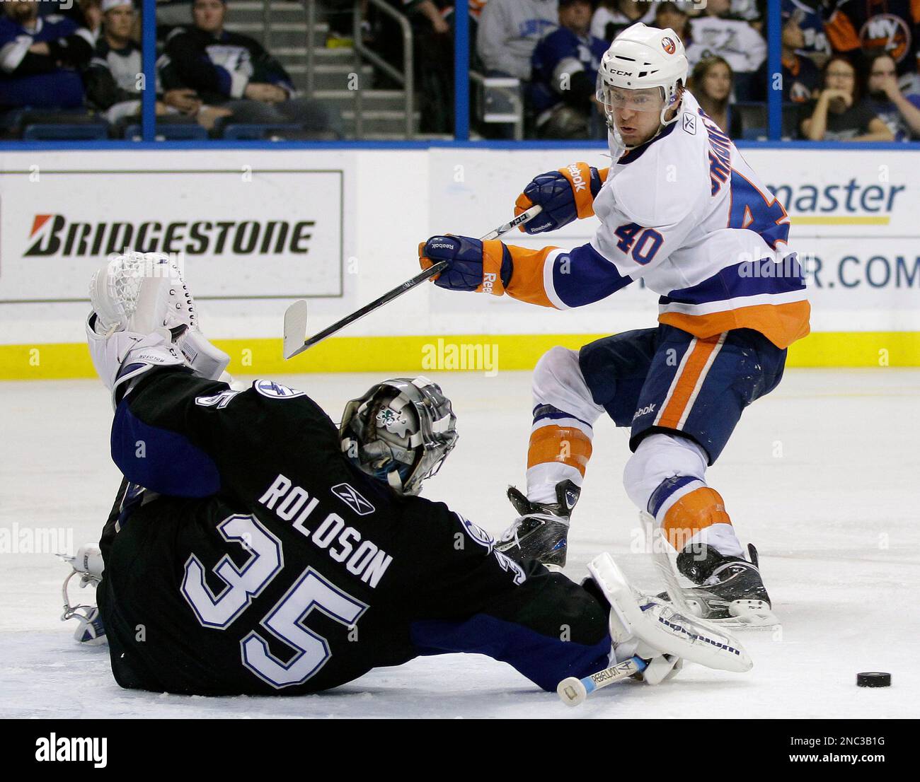 New York Islanders right wing Michael Grabner (40) gets stopped by ...