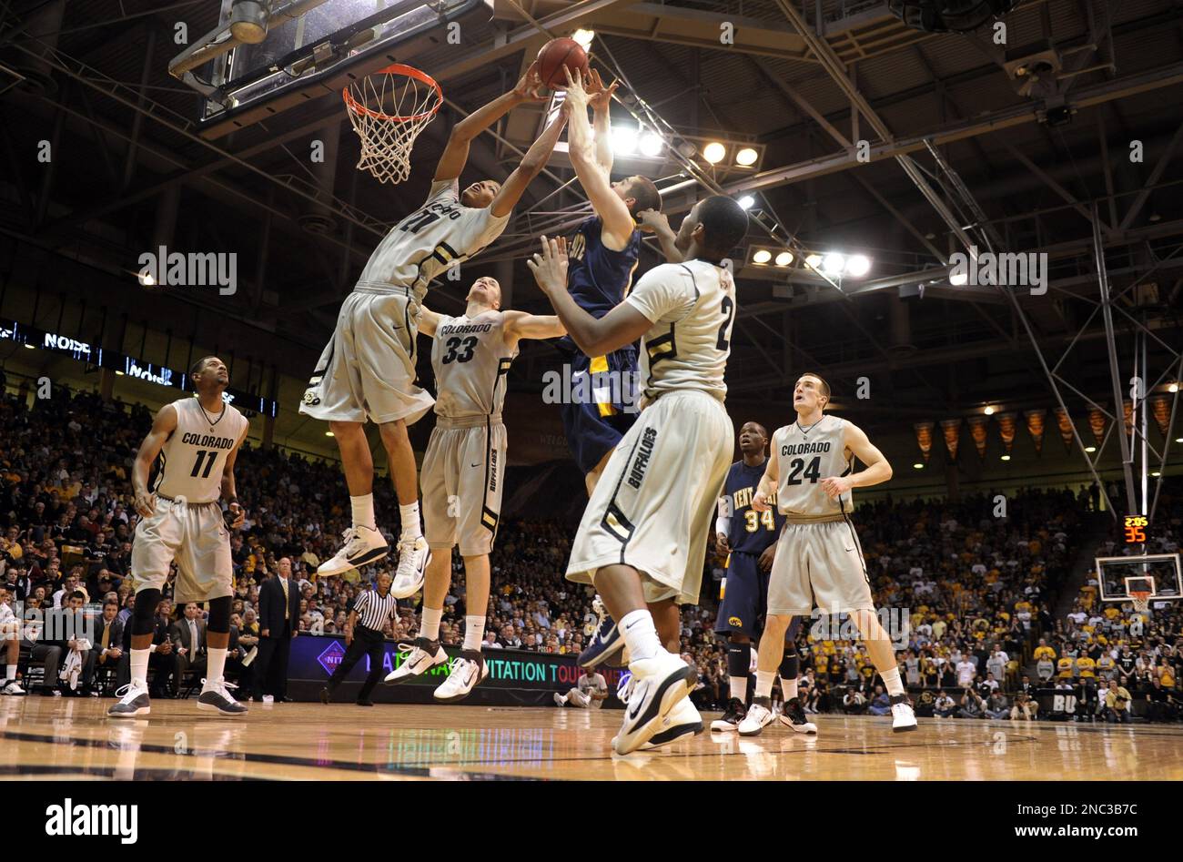 Colorado guard Andre Roberson (21), Austin Dufault (33), Shannon Sharpe ...