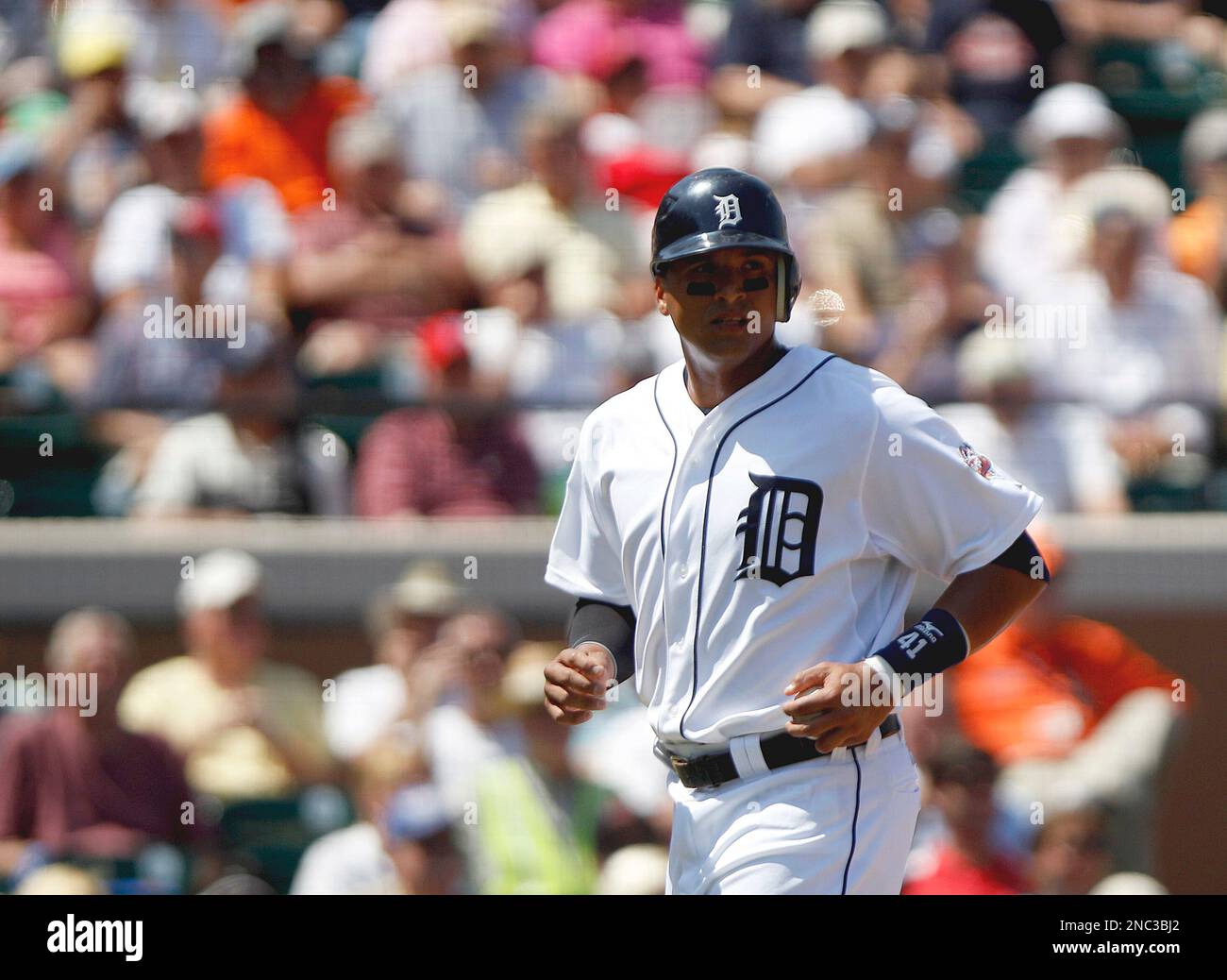 Detroit Tigers catcher Victor Martinez (41) scores in a spring training ...